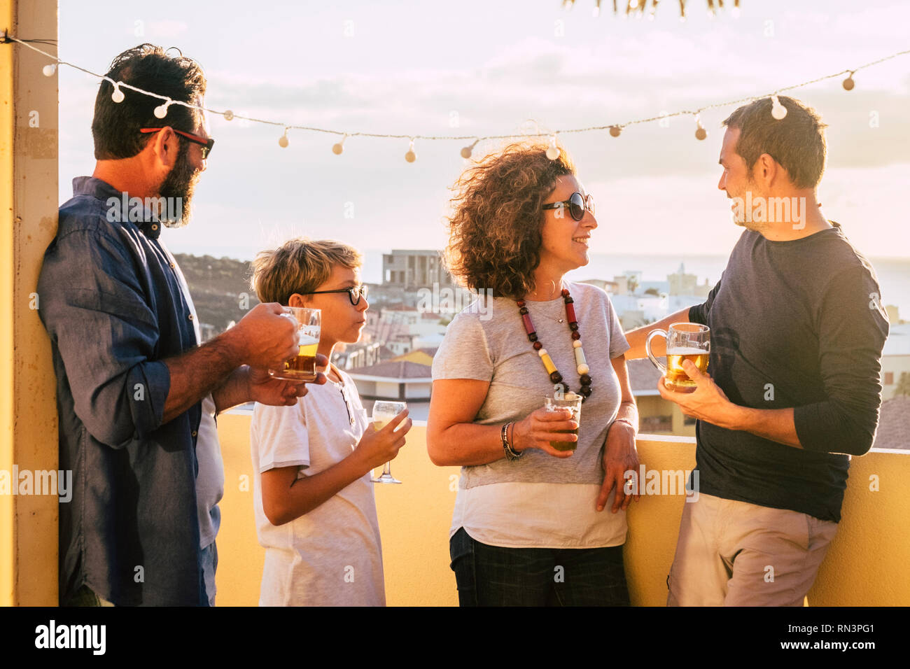 Group of middle age people caucasian men and woman drink together on ...