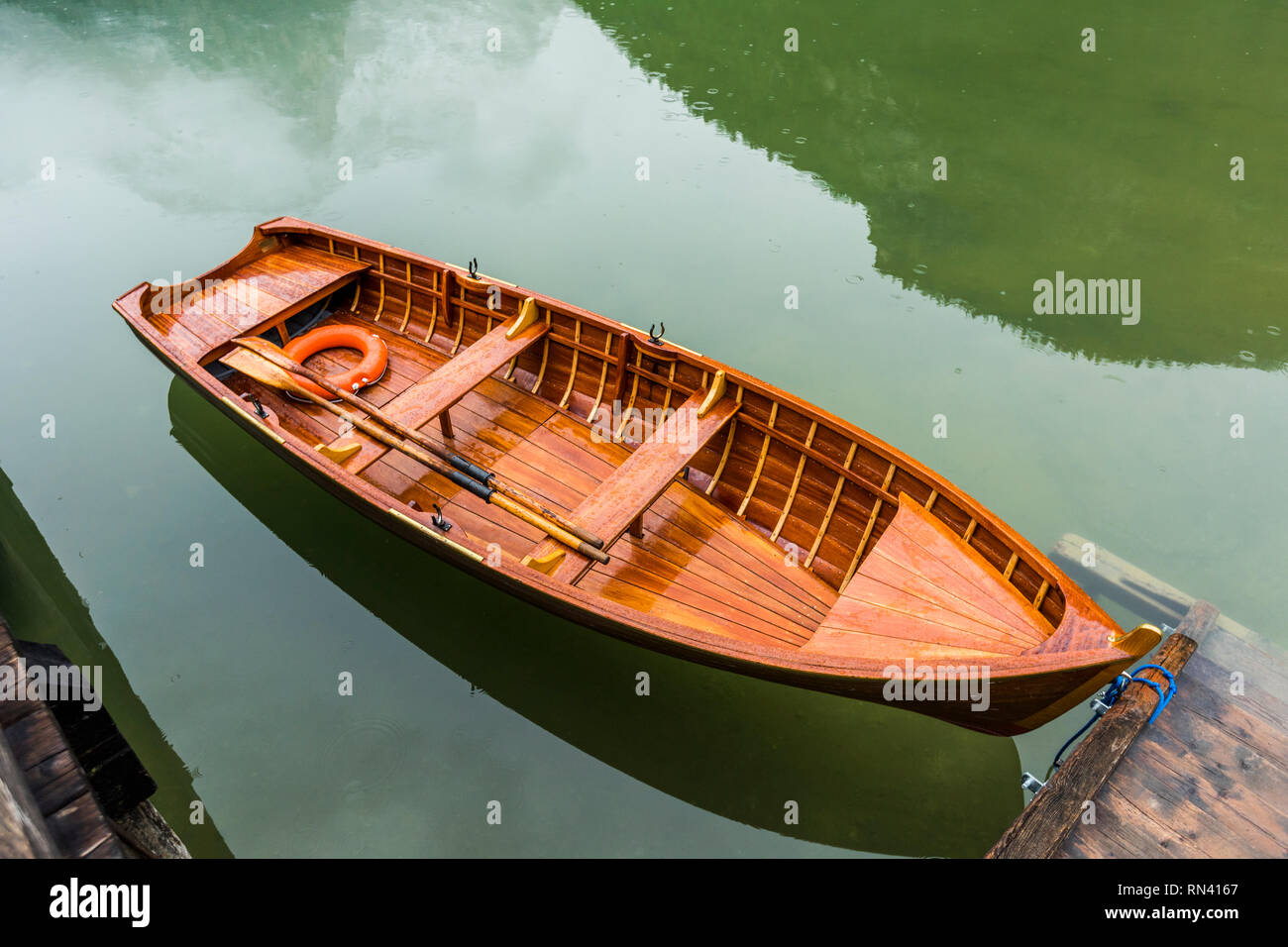 Row boat on lake Stock Photo - Alamy
