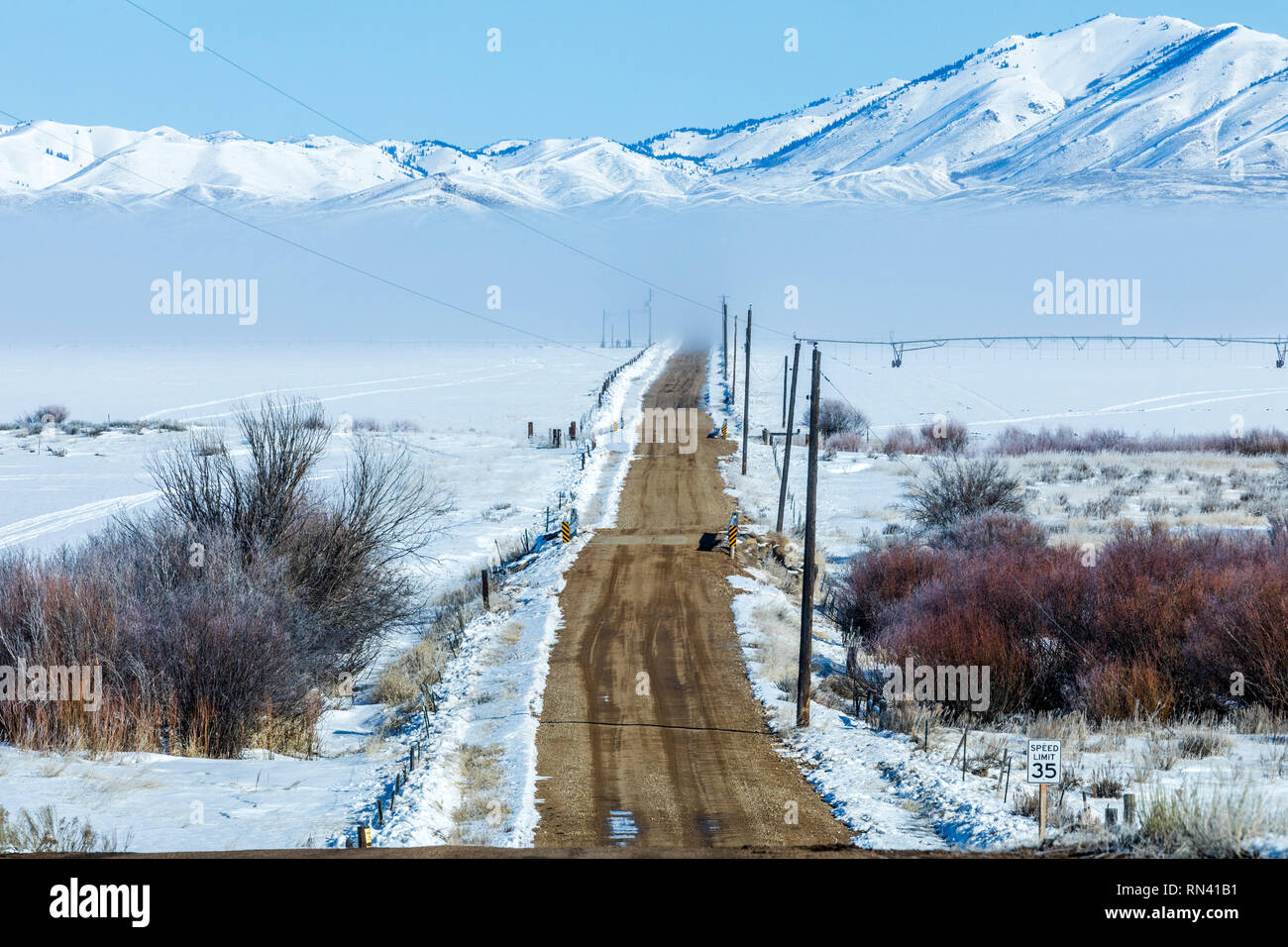 Rural road during winter in Fairfield, Idaho Stock Photo - Alamy
