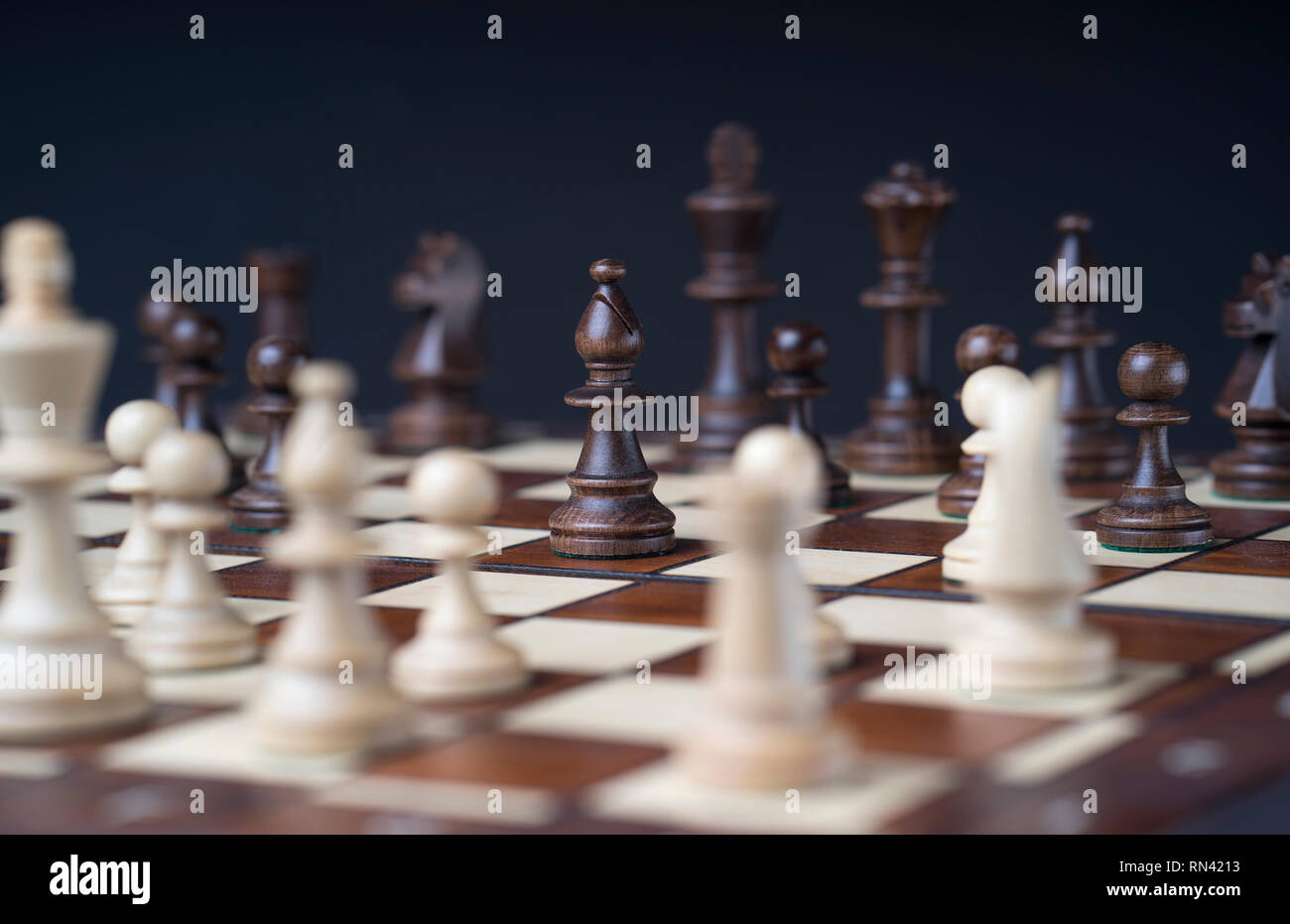 Chess pieces on board Stock Photo - Alamy