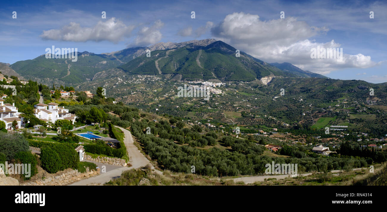View of La Maroma and the village of Alcaucin in Axarquia, Andalucia ...