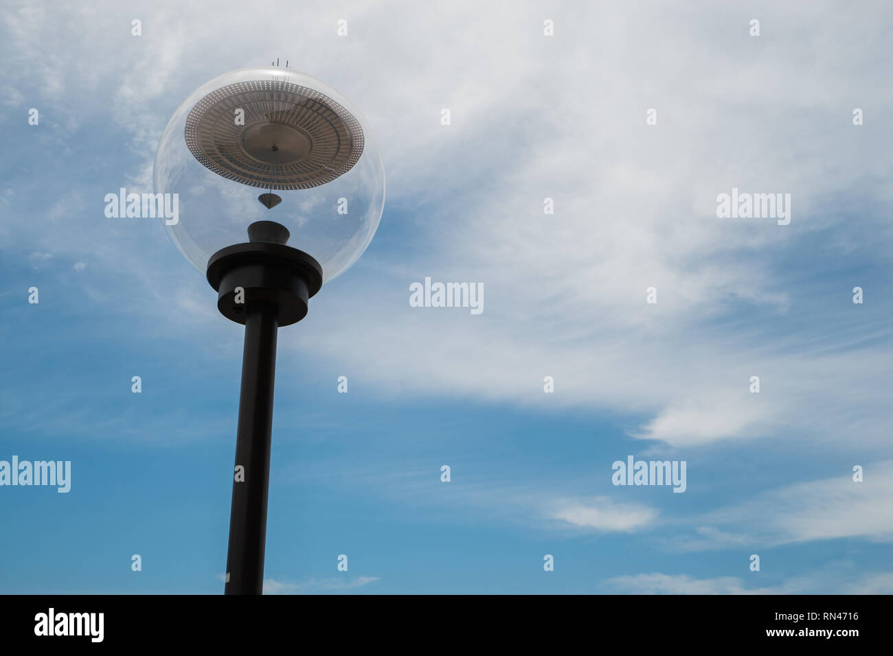 Modern lamp post against a blue sky hi-res stock photography and images ...