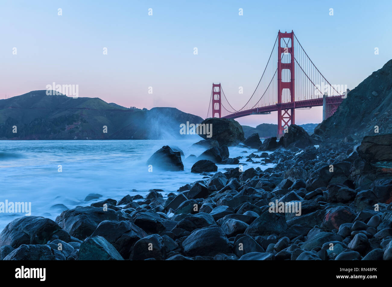 View of the Golden Gate Bridge from Marshall Beach at early dawn at ...
