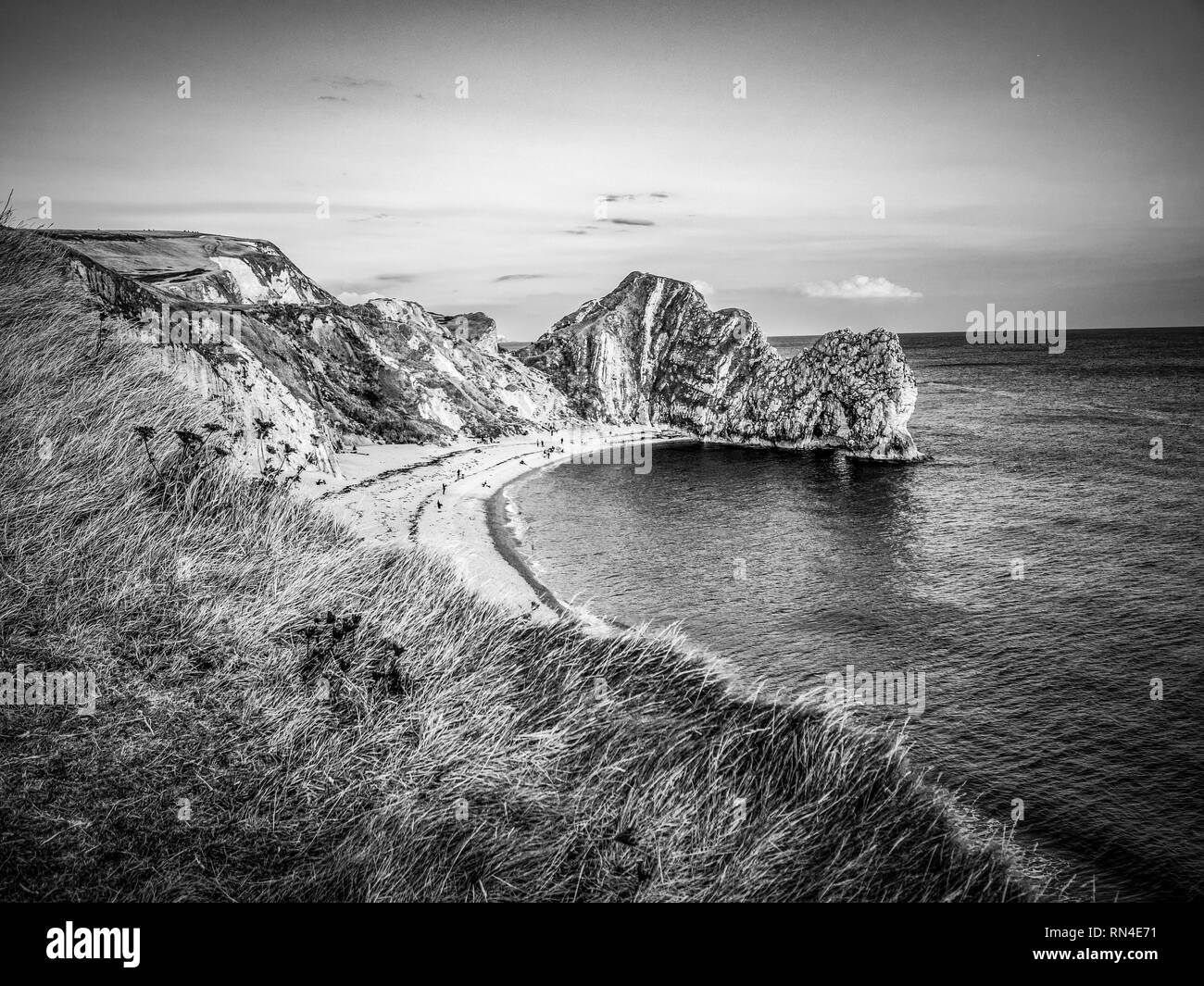 Sunset over Durdle Door - the most famous landmark in Devon England ...