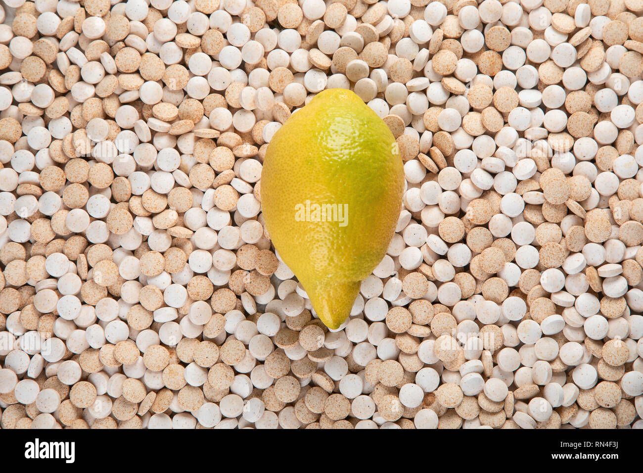 Various medicine pills, tablets and lemon. Top view Stock Photo - Alamy