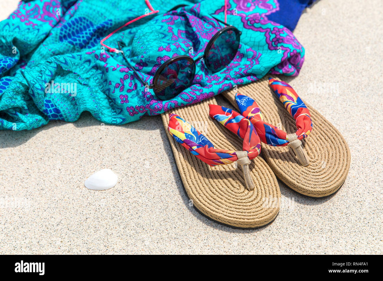 background sand background summer slippers and Coral Color Pareo ...