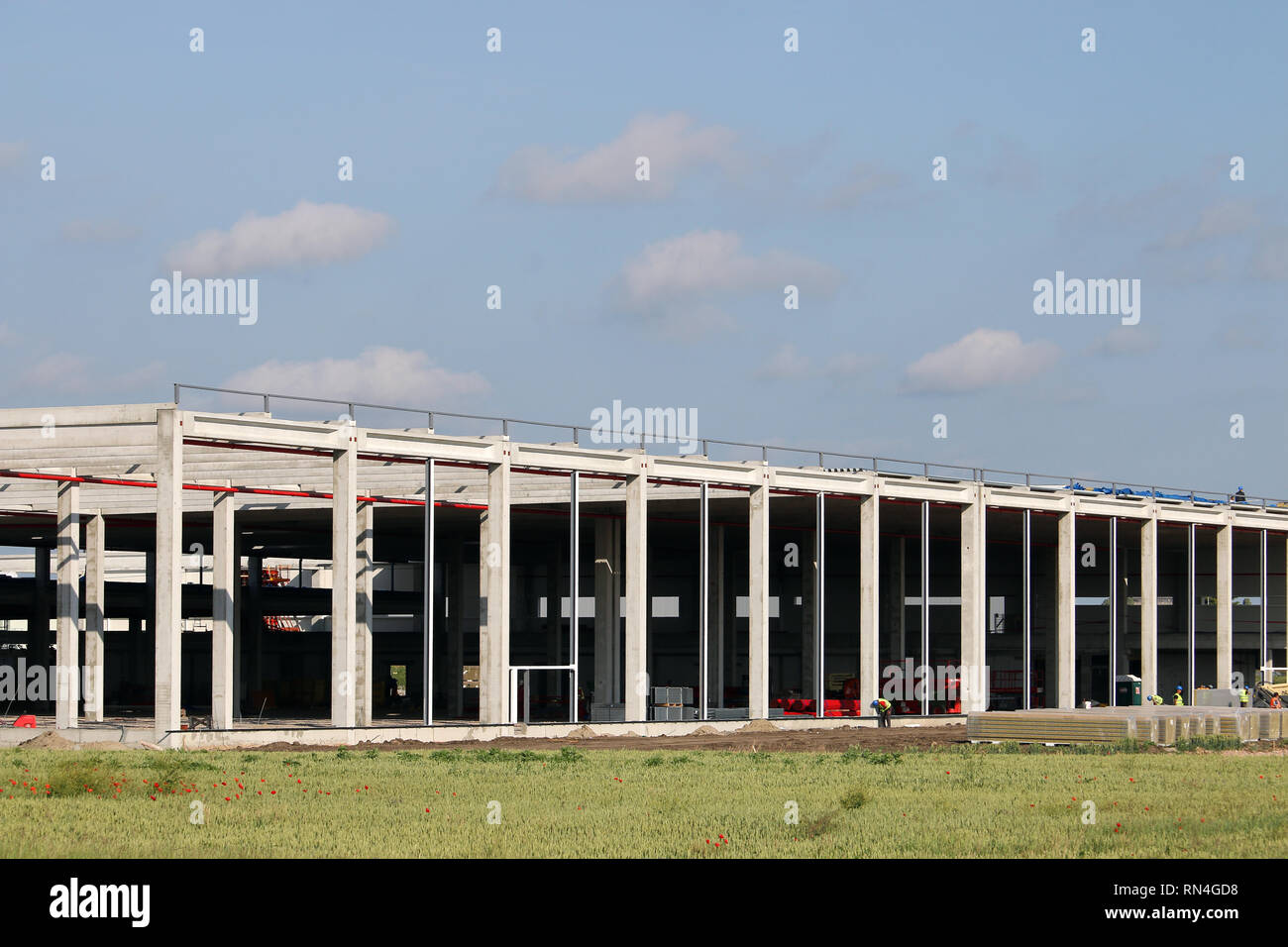 factory construction site with workers industry Stock Photo - Alamy