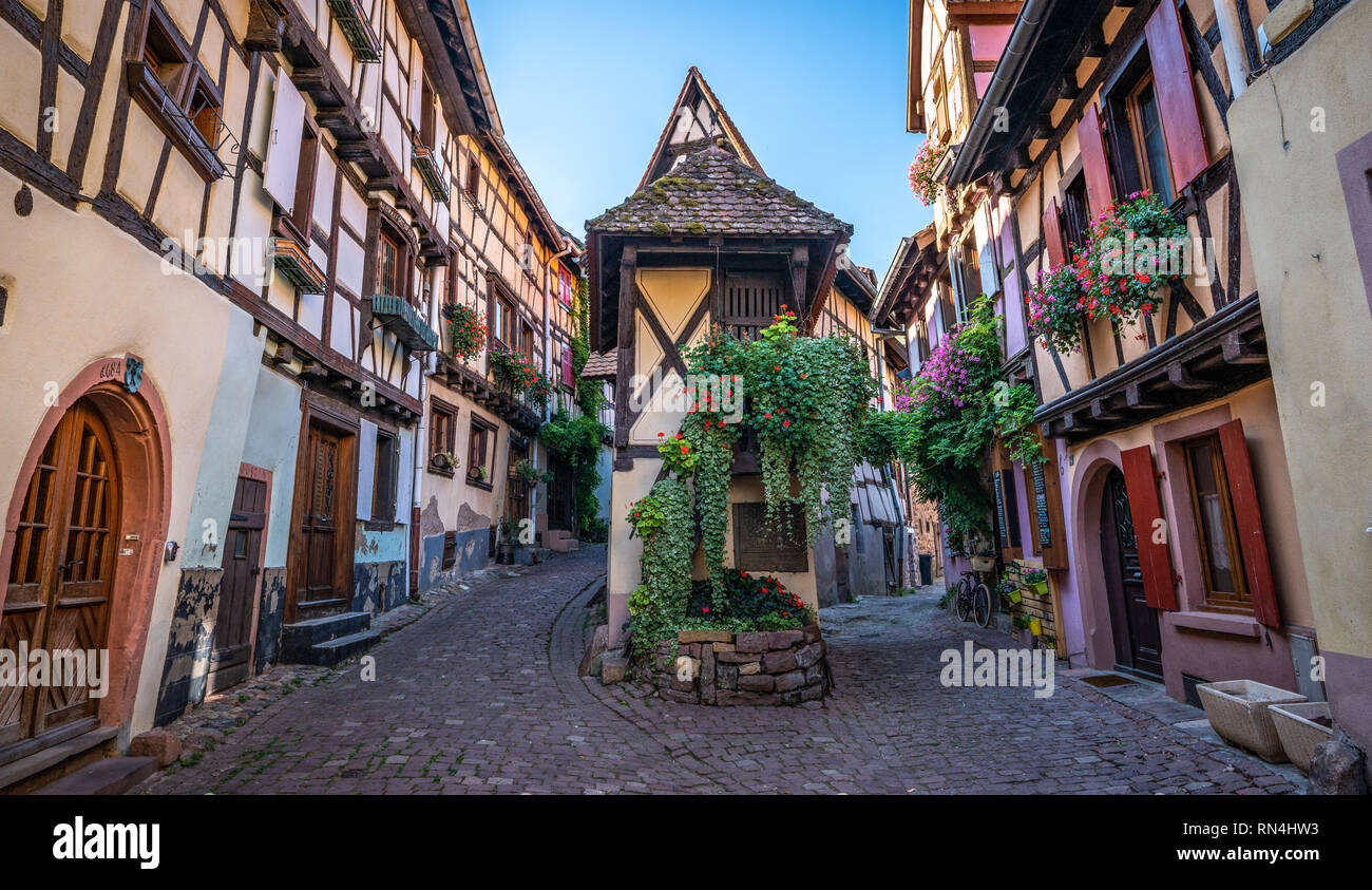 Colorful medieval half timbered buildings in Alsace village in France ...