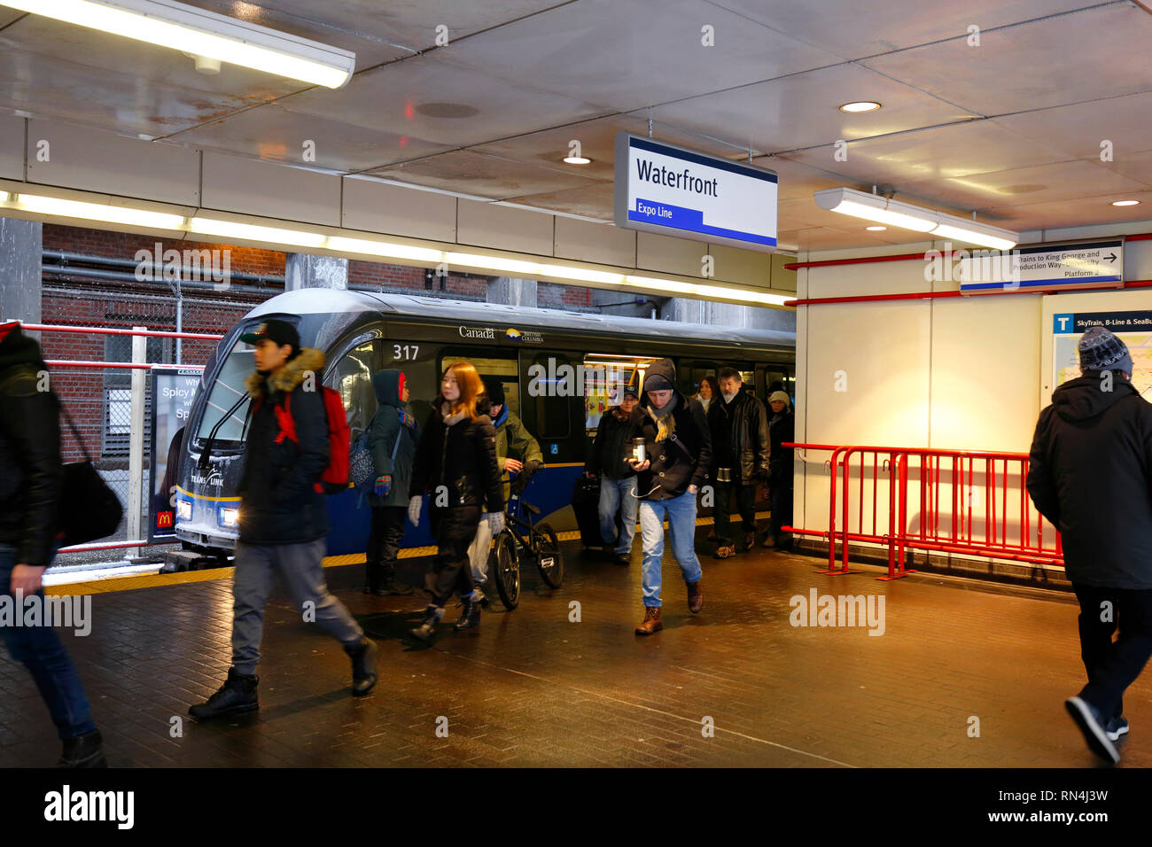 Vancouver Expo Line SkyTrain commuters exiting Waterfront Station ...