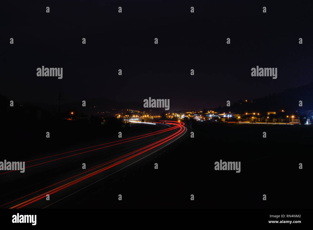Long exposure Car Light trail at night in the highway Stock Photo - Alamy