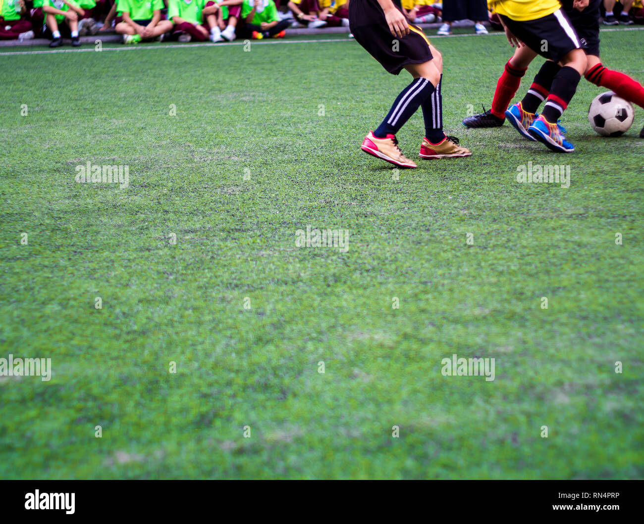 The footballers are competing in sports of elementary school Stock ...