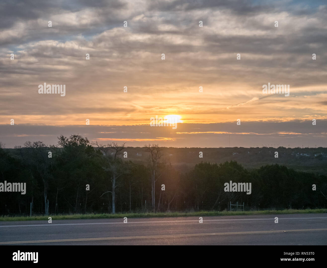 View of Two Way Road With Sunrise in the Background Stock Photo - Alamy