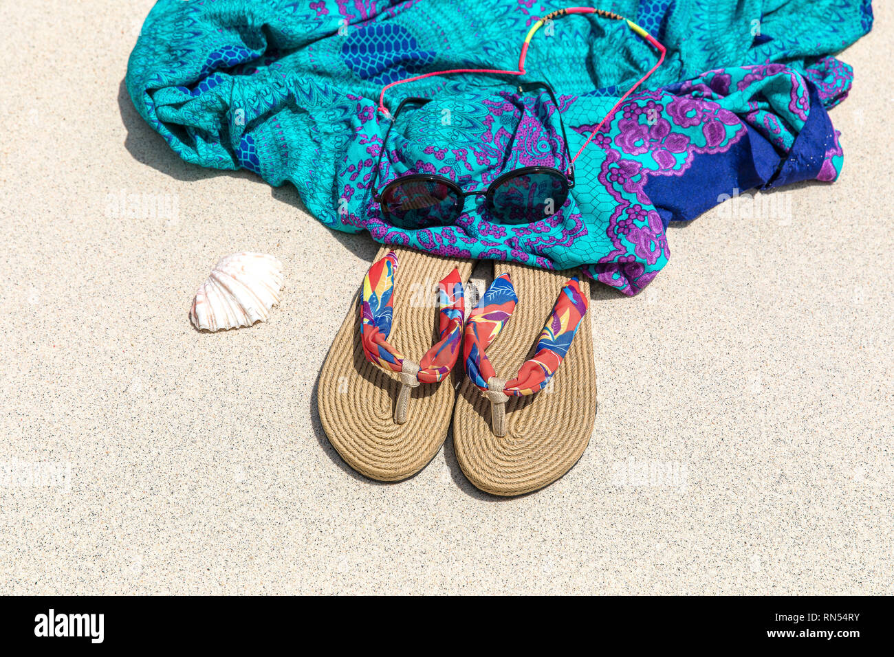 background sand background summer slippers and Coral Color Pareo ...