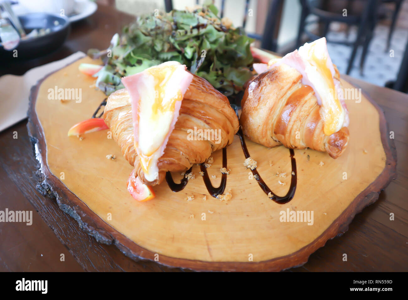 ham and cheese croissant or croissant with ham and cheese topping dish ...