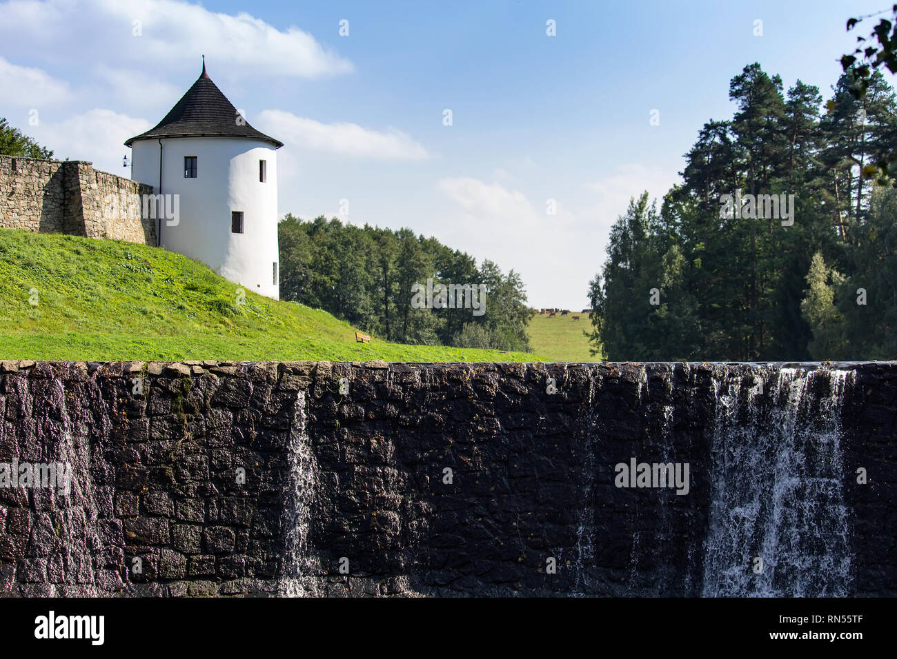 Small weir with Tower of old castle Zumberk, Czech republic Stock Photo ...
