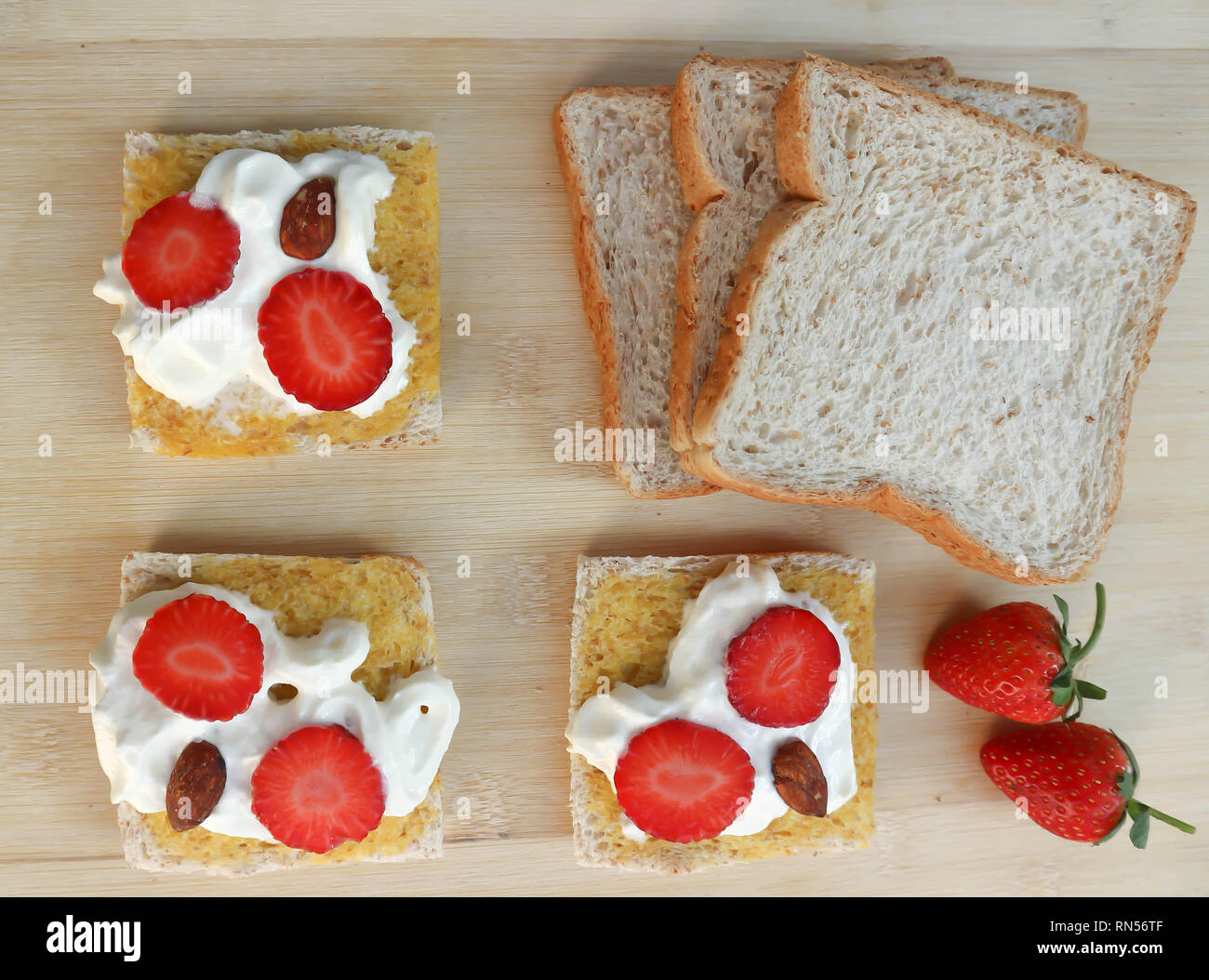 whole wheat bread and canape with strawberry topping Stock Photo - Alamy