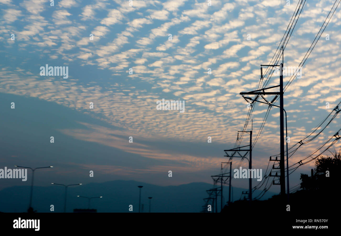 sky, cloud ,electricity pole and mountain Stock Photo - Alamy