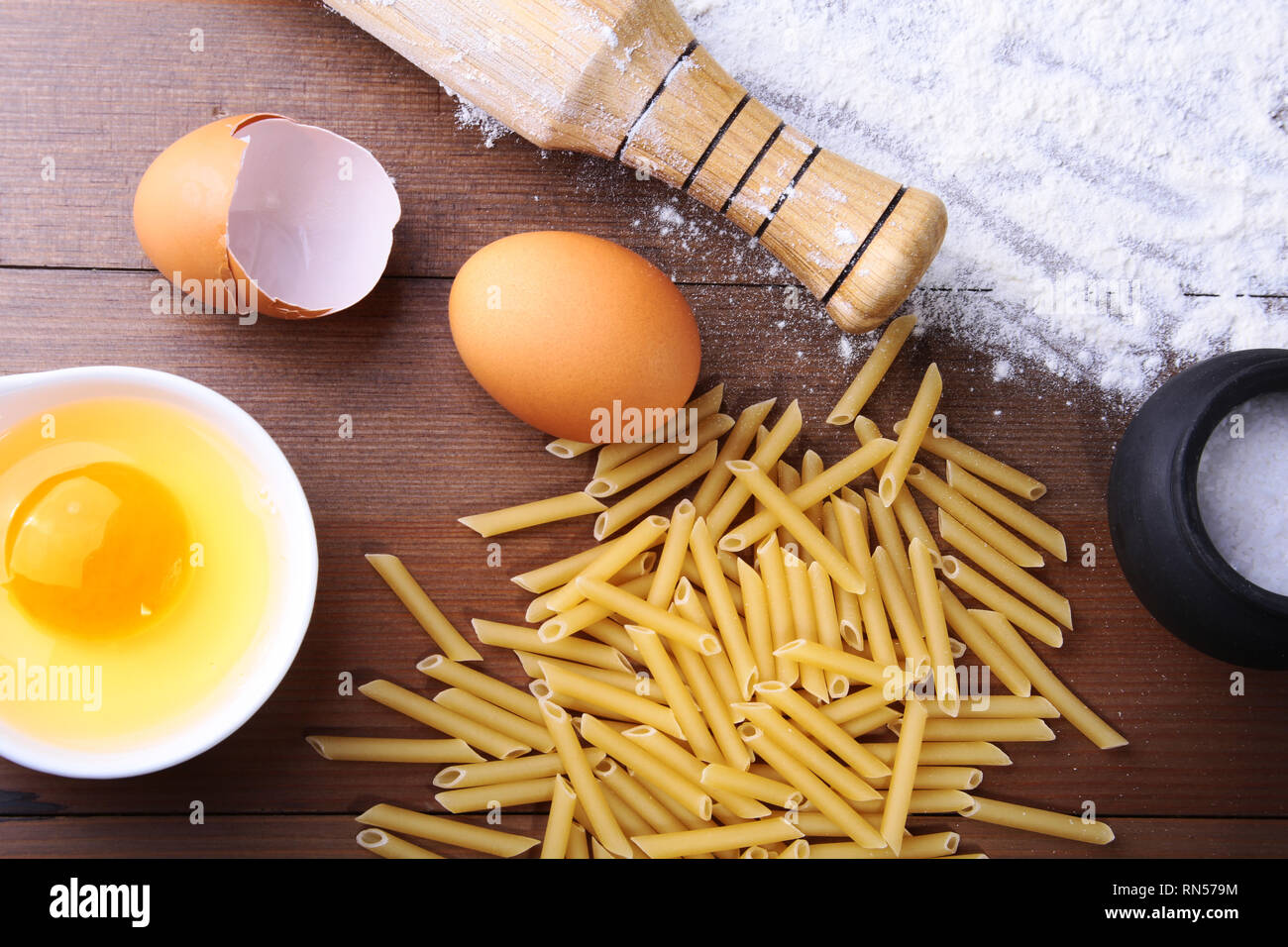 egg, flour, salt ingredients for pasta spaghetti. Cooking concept. Top ...