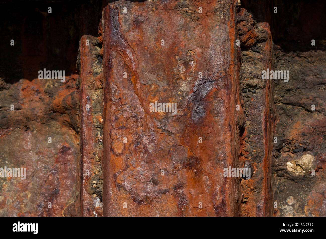 Rusting metal girder on beach Stock Photo - Alamy