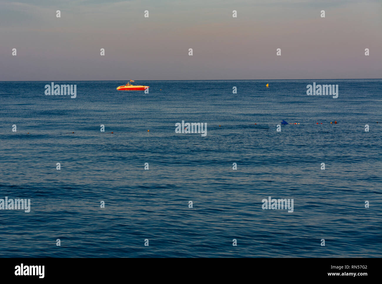 White speedboat on the background of the coast and blue sky. Photos of ...