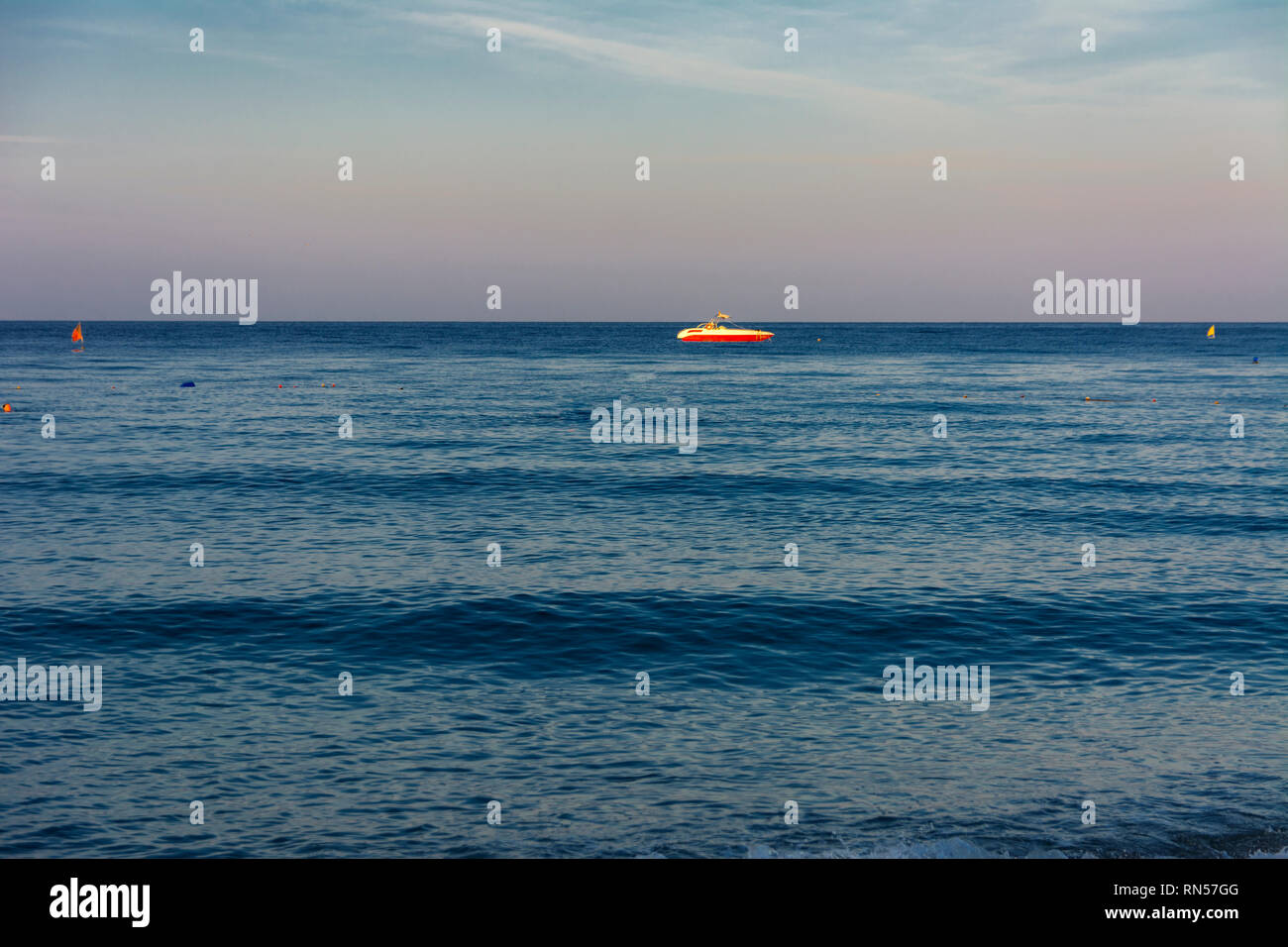 White speedboat on the background of the coast and blue sky. Photos of ...