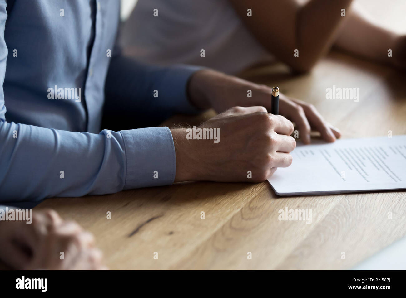 Signing legal document hi-res stock photography and images - Alamy