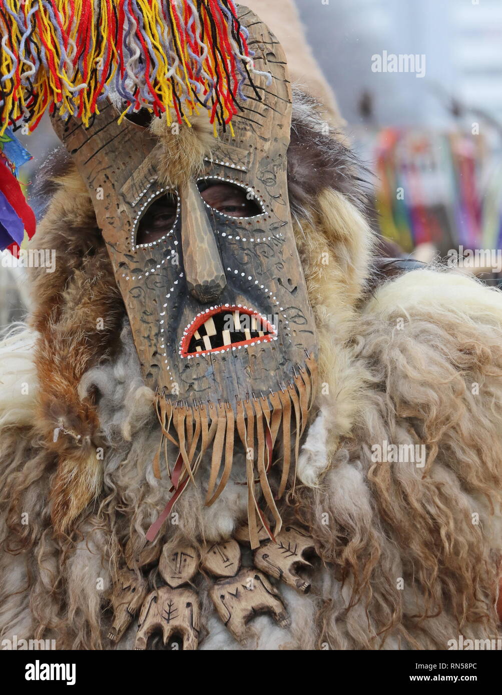 Masquerade festival Surva in Pernik, Bulgaria. People with mask called ...