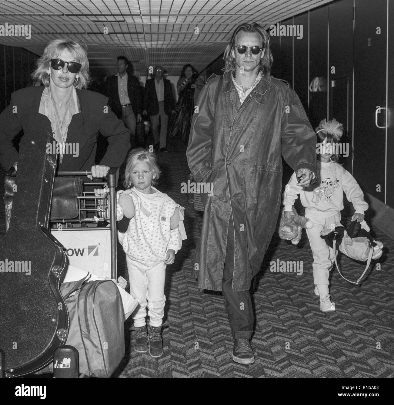 Rock singer Sting with wife Trudie Styler and children arriving at ...