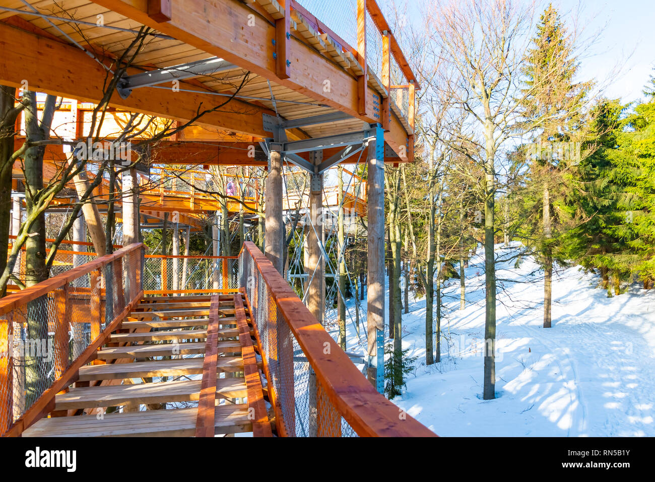 A new wooden lookout tower or sky walking in trees in Pustevny, Beskids ...