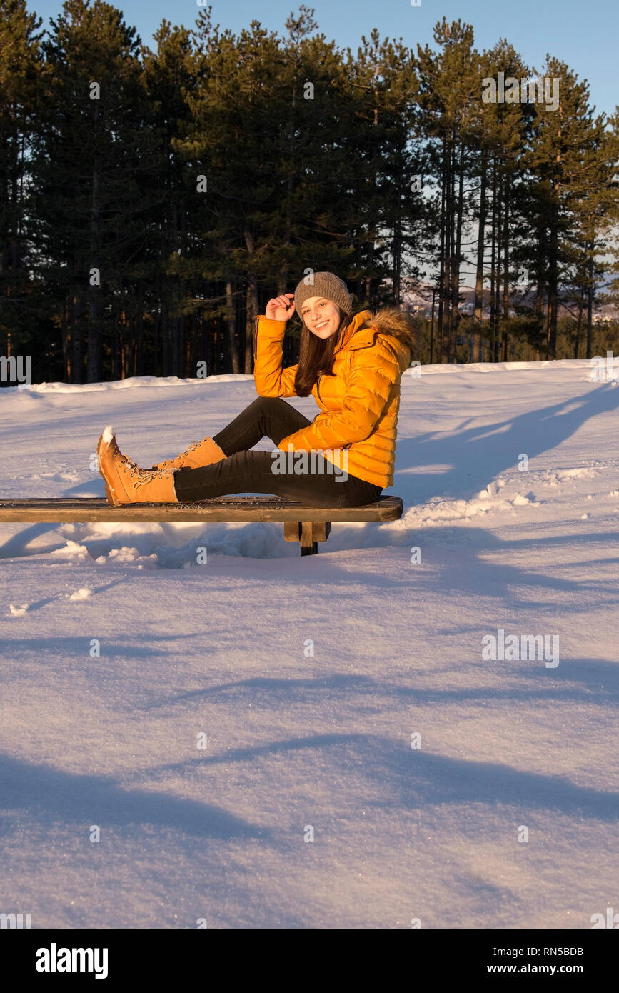 Beautiful girl modeling on snow Stock Photo - Alamy