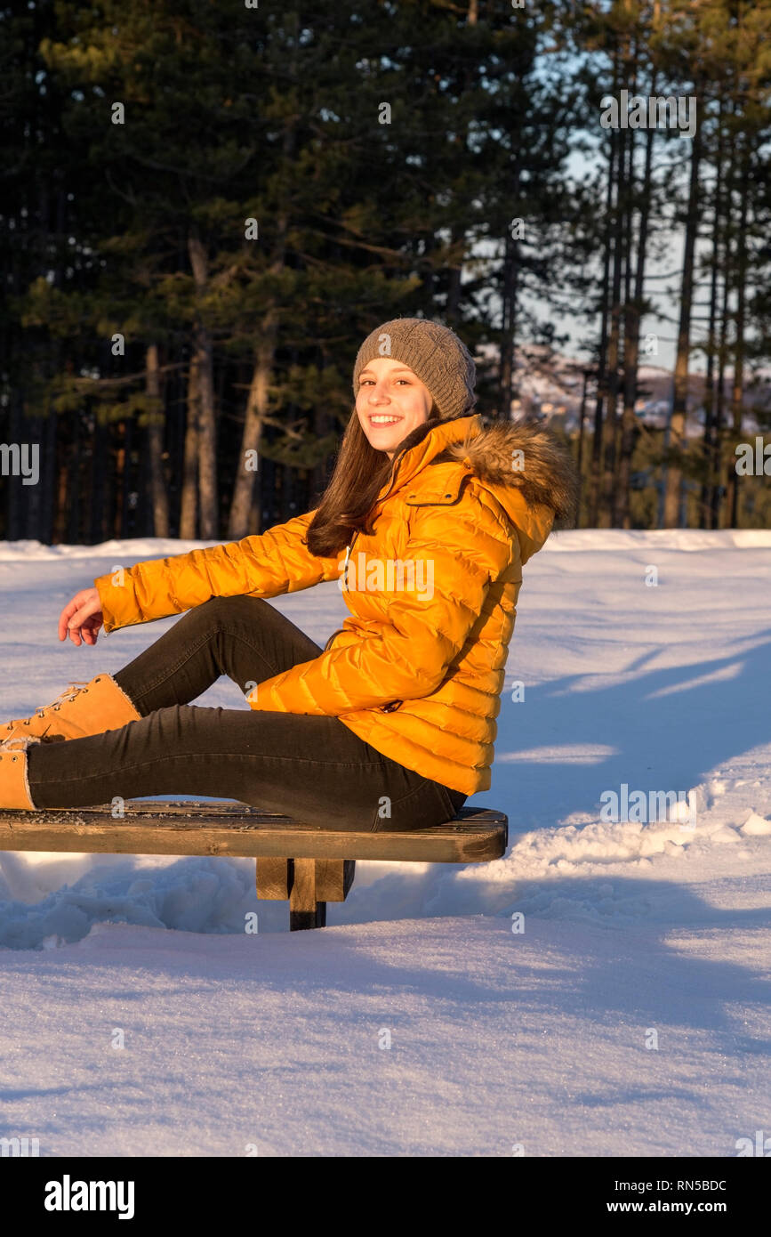 Beautiful girl modeling on snow Stock Photo - Alamy