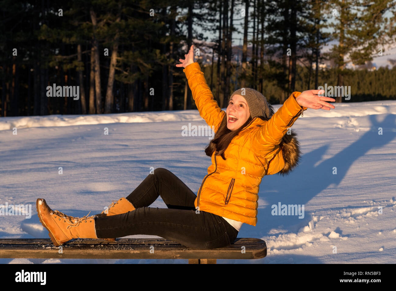 Beautiful girl modeling on snow Stock Photo - Alamy