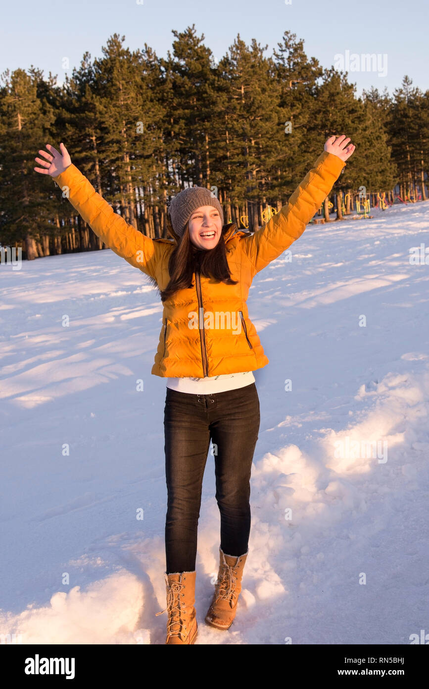 Beautiful girl modeling on snow Stock Photo - Alamy