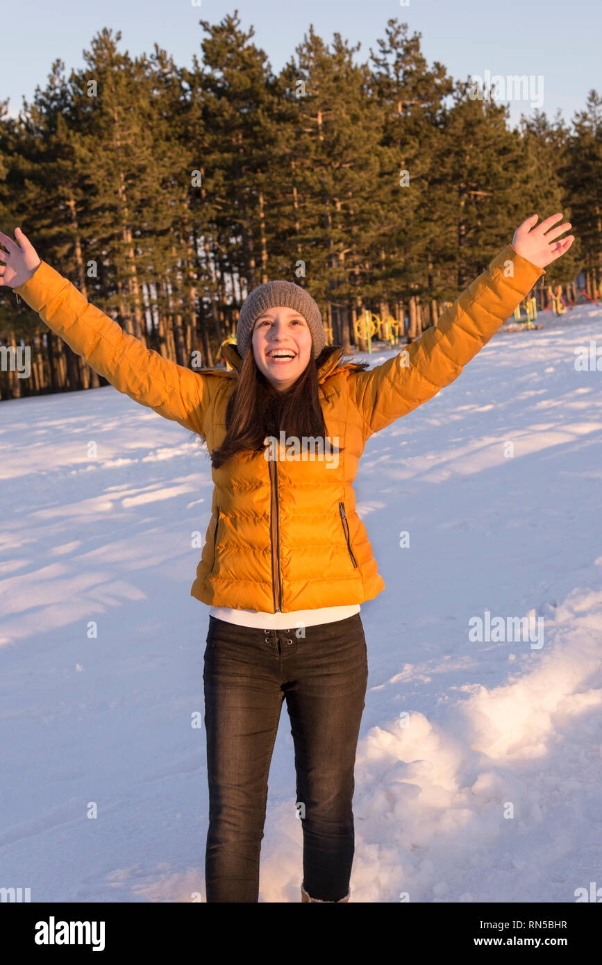 Beautiful girl modeling on snow Stock Photo - Alamy