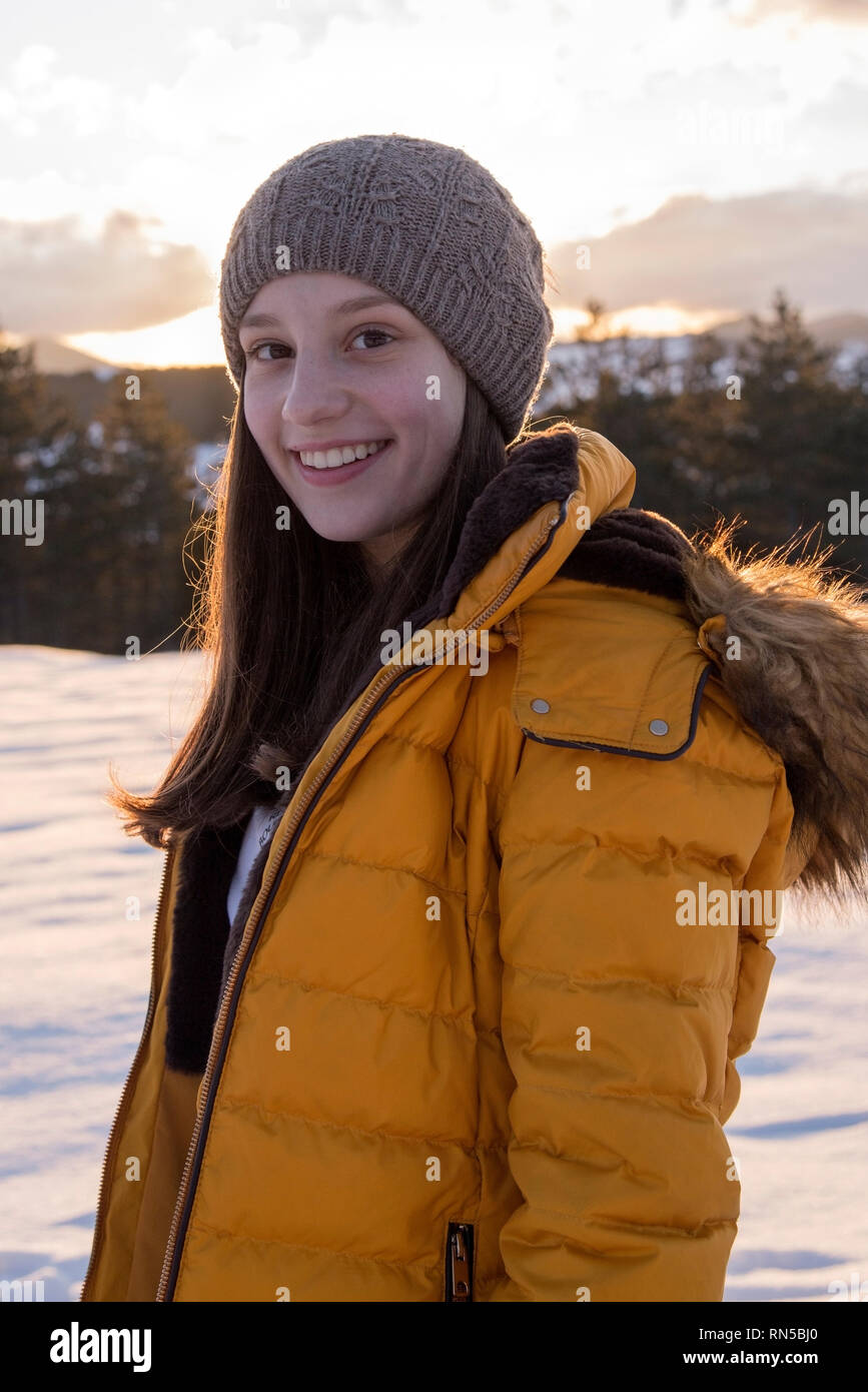 Beautiful girl modeling on snow Stock Photo - Alamy