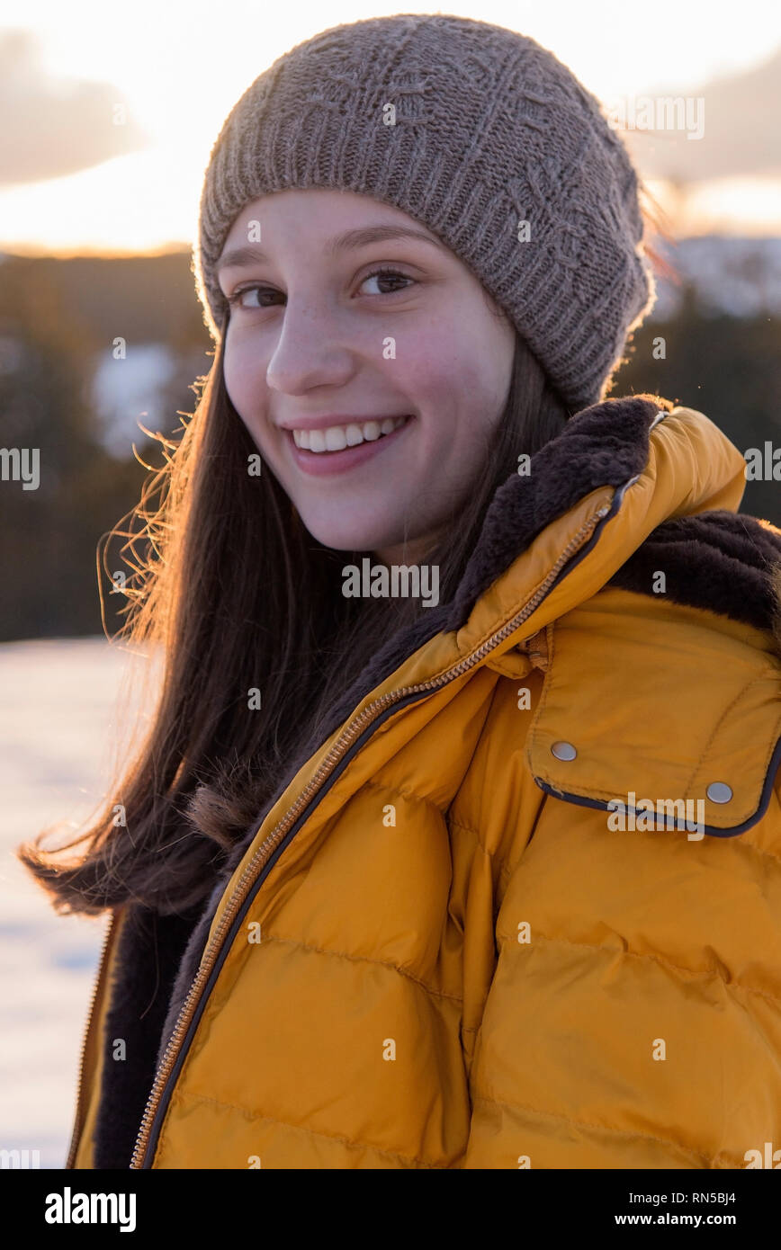 Beautiful girl modeling on snow Stock Photo - Alamy