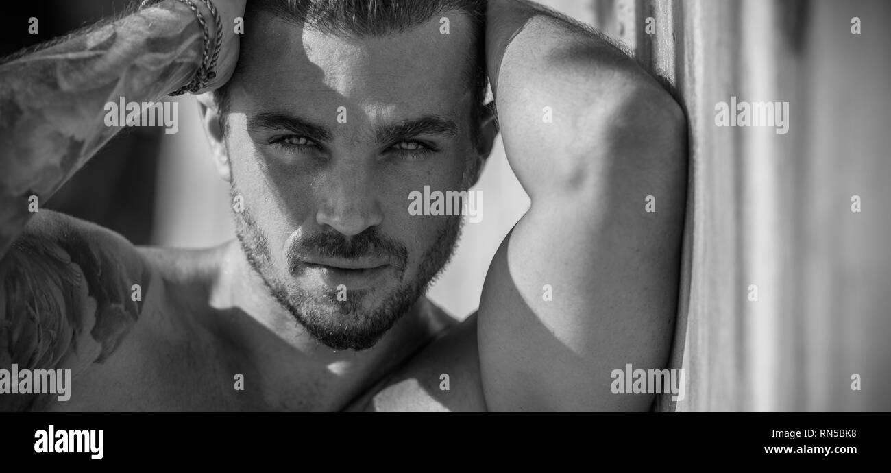 Fashion male model on beach Black and White Stock Photos & Images - Alamy