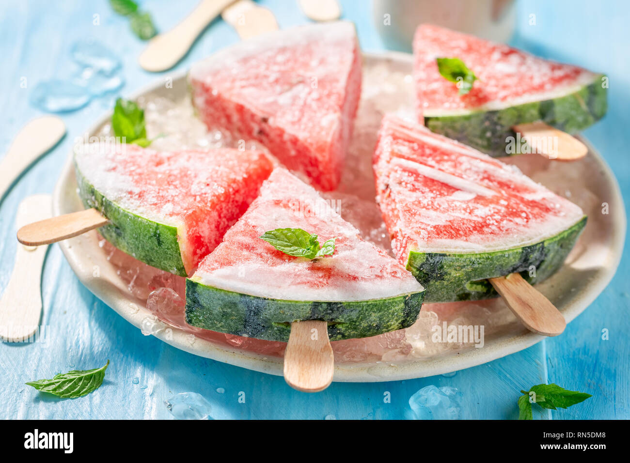 Yummy ice cream made of watermelon on a stick Stock Photo - Alamy