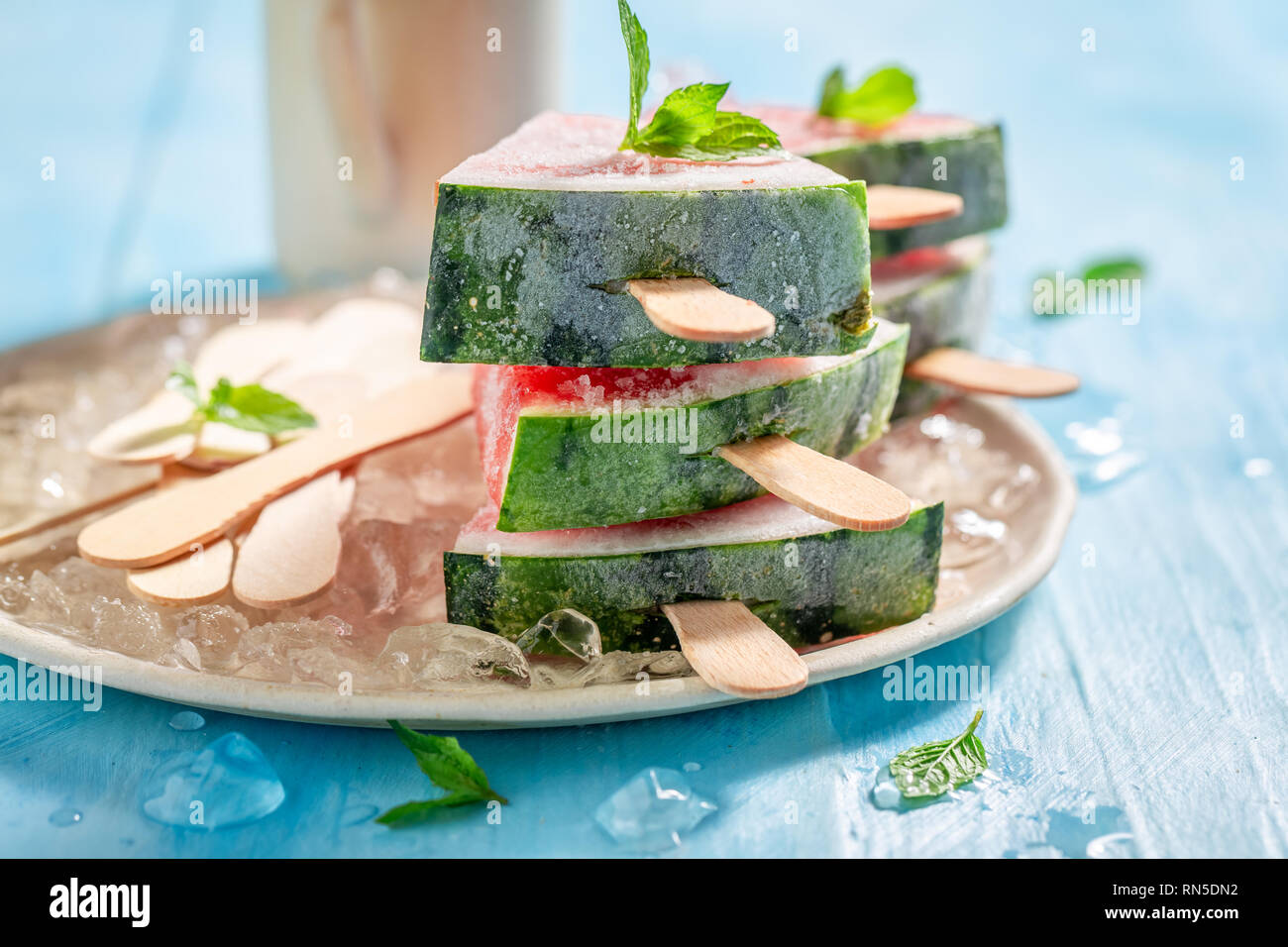 Juicy watermelon ice cream on a stick Stock Photo - Alamy