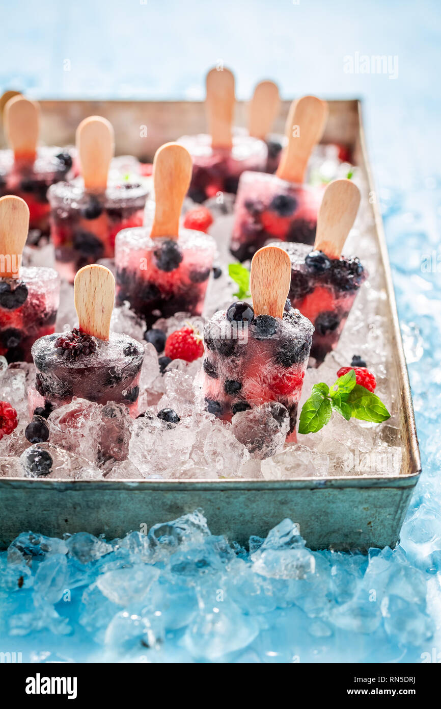 Sweet berry fruits ice cream on cold ice Stock Photo - Alamy