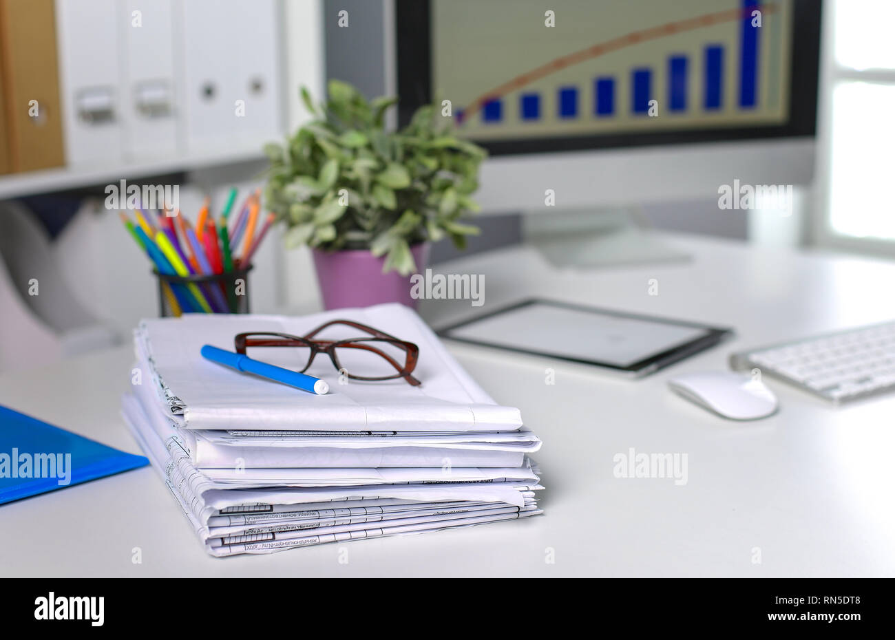 Workspace desktop, documents on the office table Stock Photo - Alamy