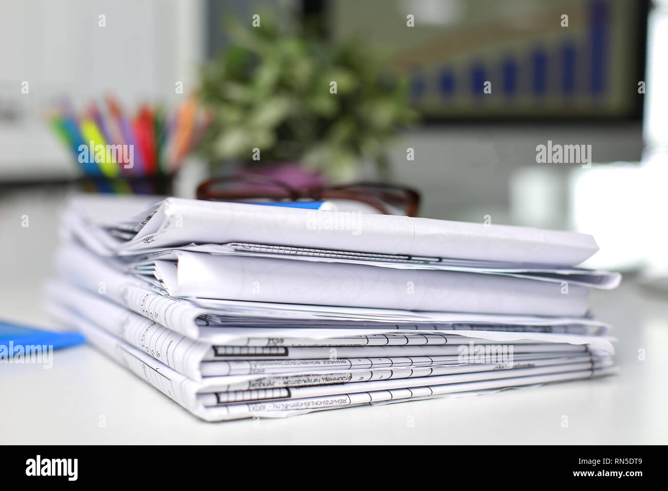 Workspace desktop, documents on the office table Stock Photo - Alamy