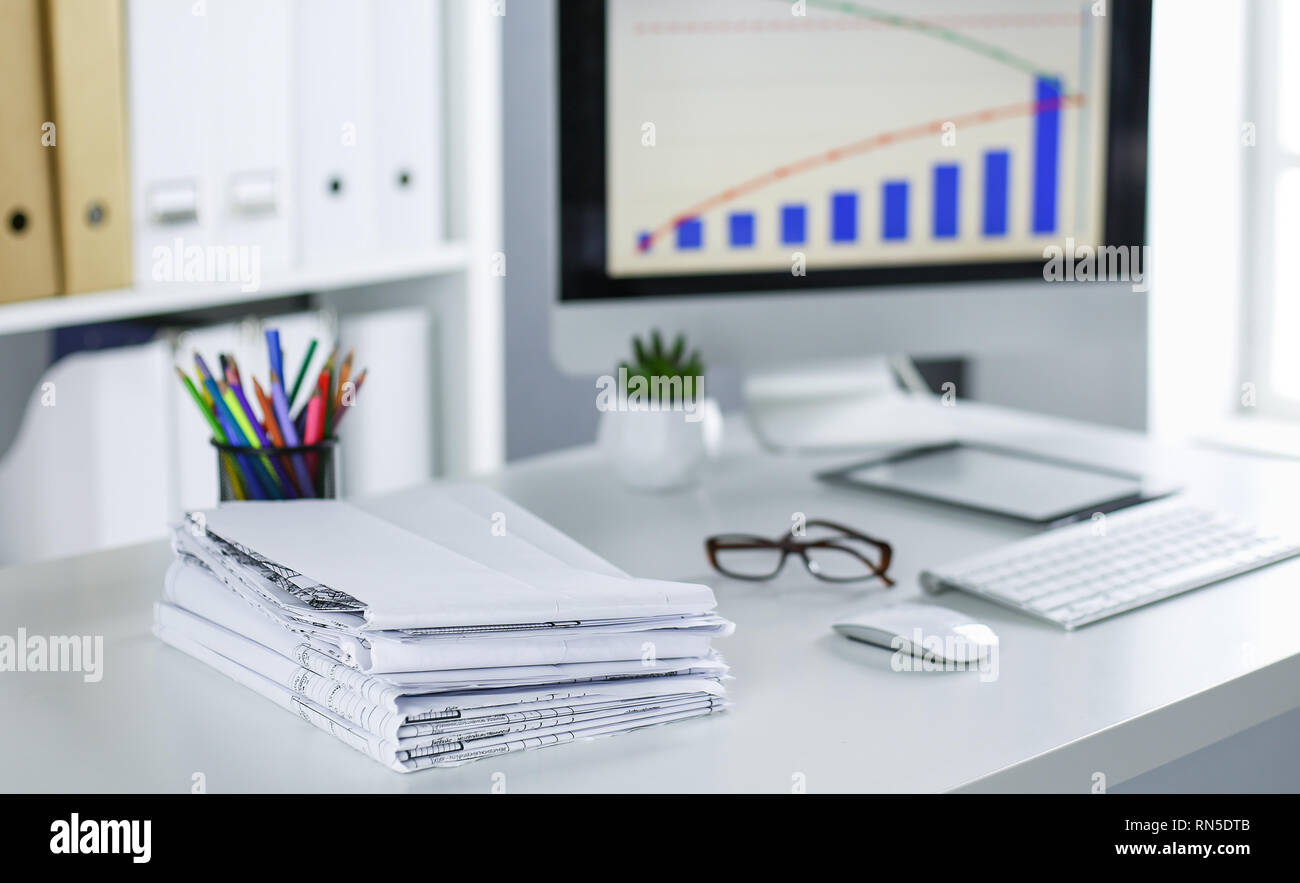 Workspace desktop, documents on the office table Stock Photo - Alamy