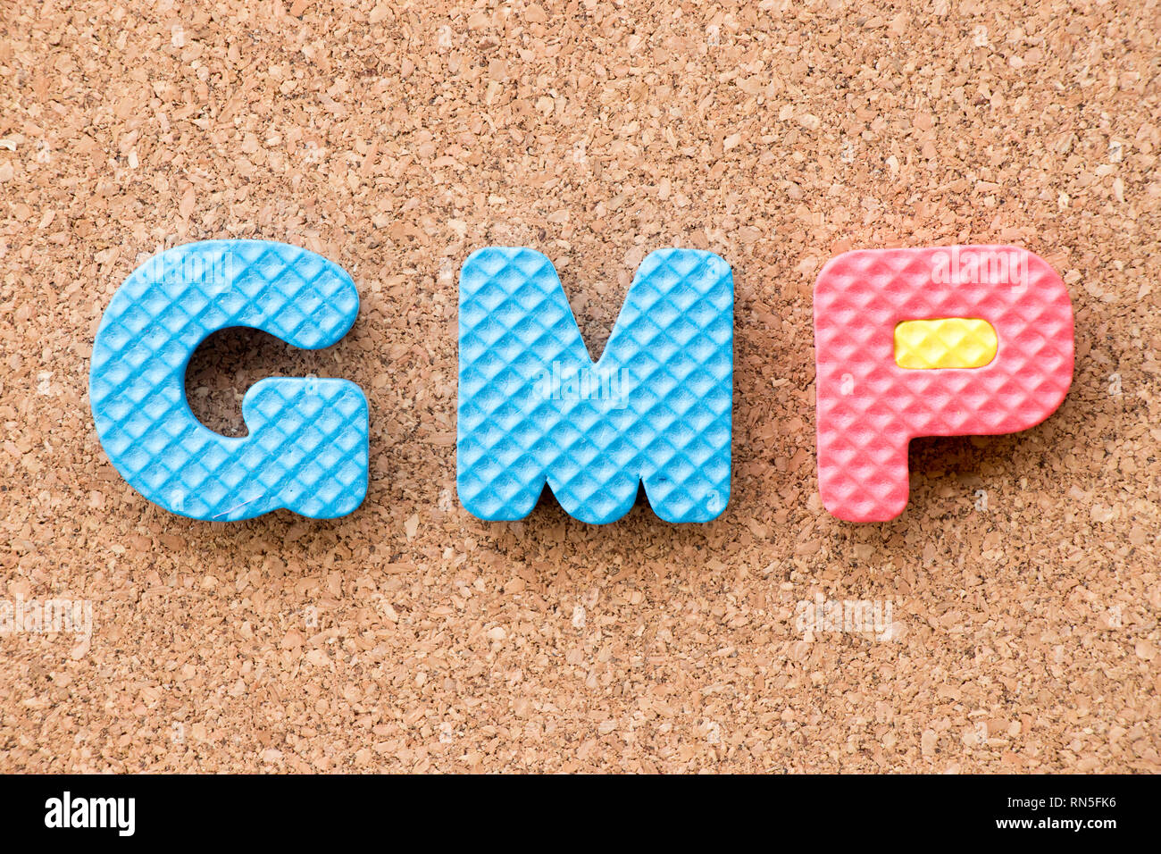 Color toy foam alphabet in word GMP (Abbreviation of Good Manufacturing ...