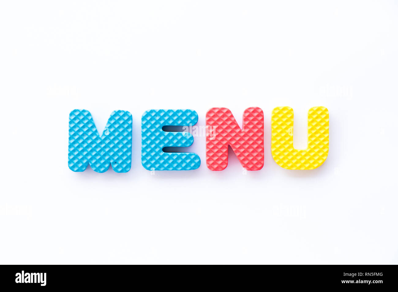 Color toy foam alphabet in word menu on white background Stock Photo ...