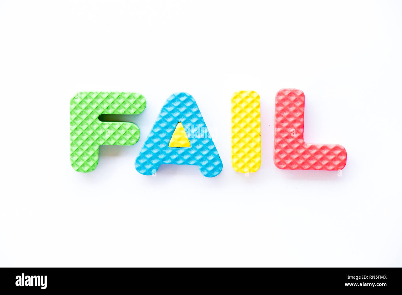 Color toy foam alphabet in word fail on white background Stock Photo ...