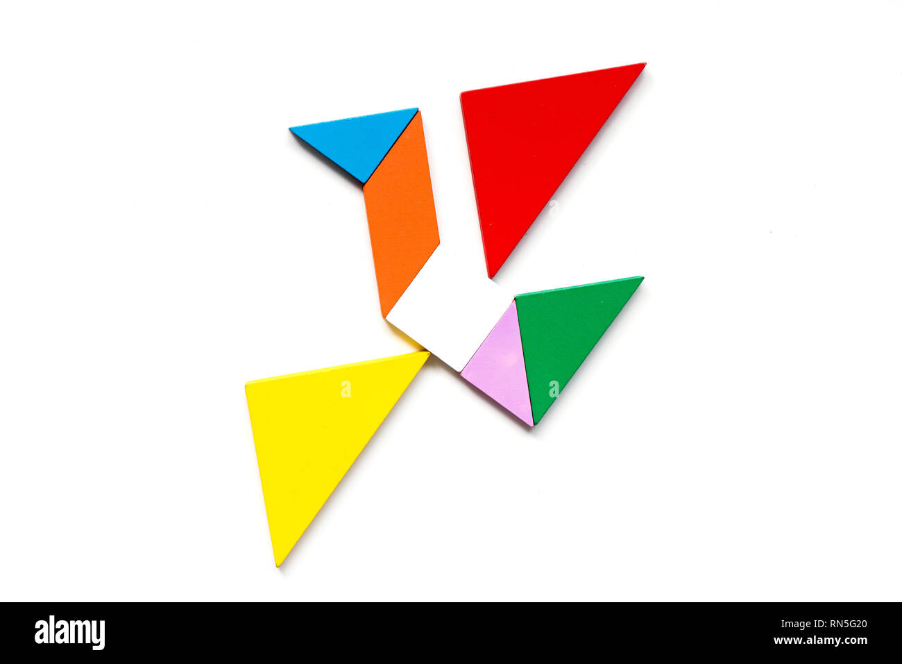 Color wood tangram puzzle in flying bird shape on white background ...