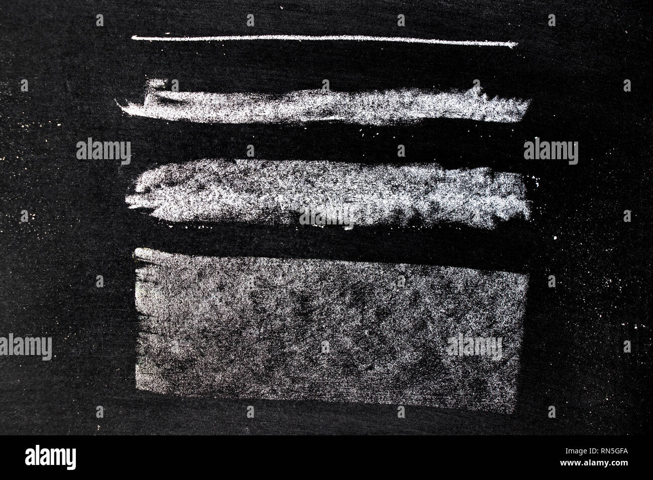 White chalk hand drawing in square or line shape on blackboard ...