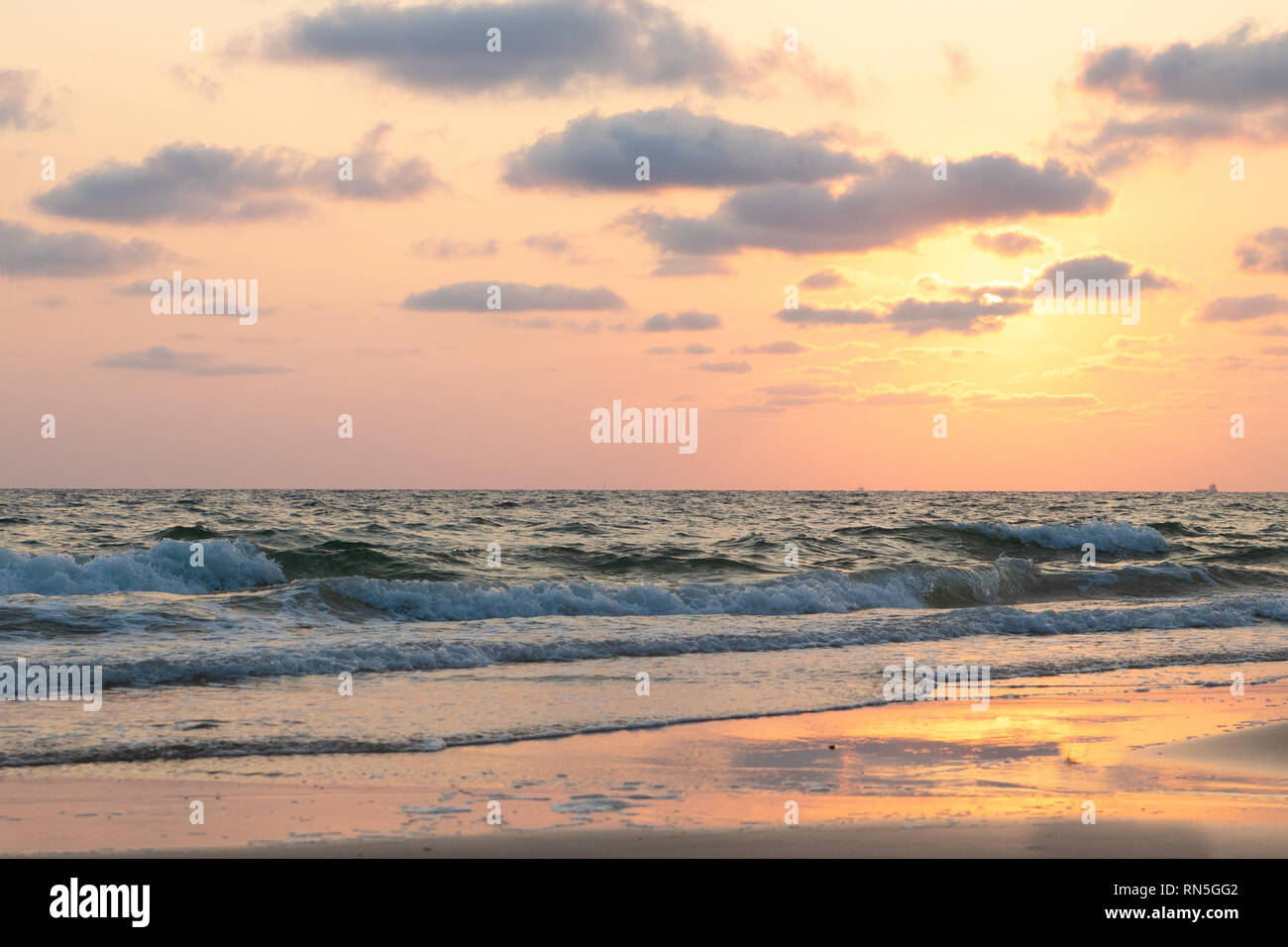 Beautiful pink sunset over sea, background Stock Photo - Alamy