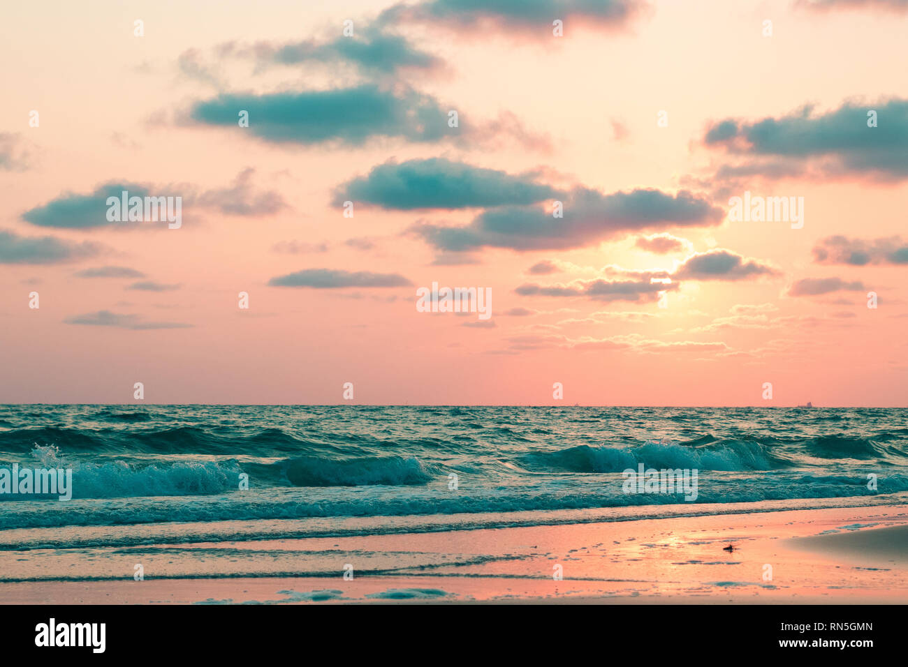 Beautiful pink sunset over sea, background Stock Photo - Alamy